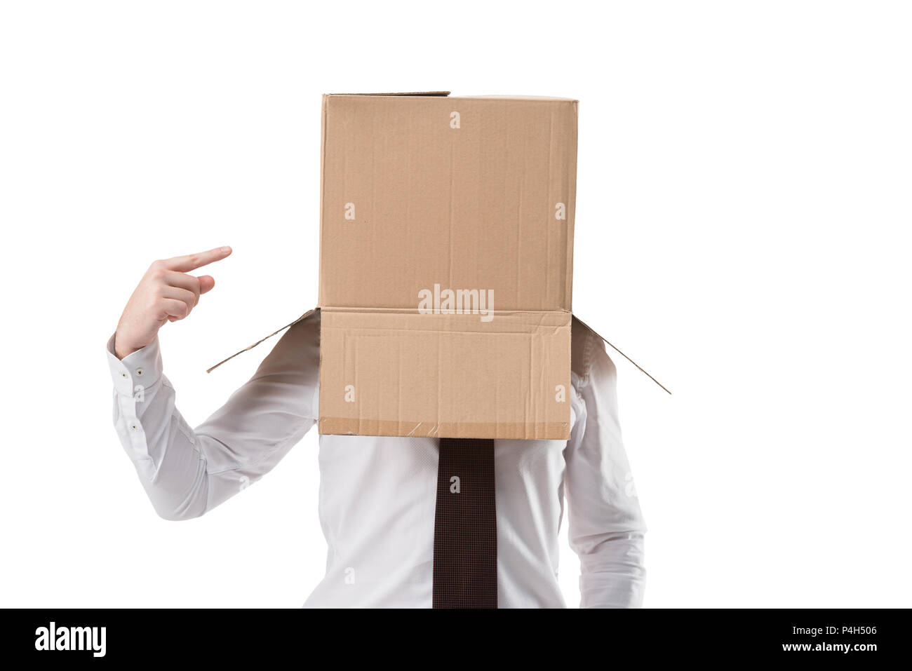 businessman pointing on cardboard box on his head, isolated on white ...