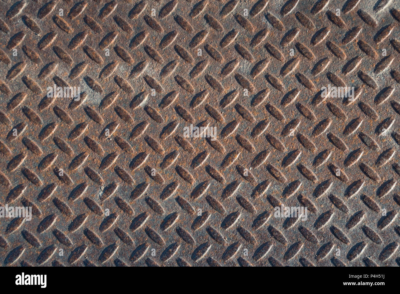 Closeup landscape of a distressed, mottled, gungy industrial ...