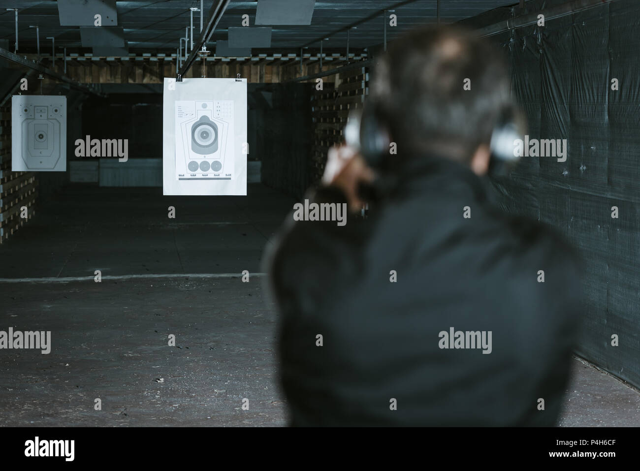 Man aiming gun hi-res stock photography and images - Alamy