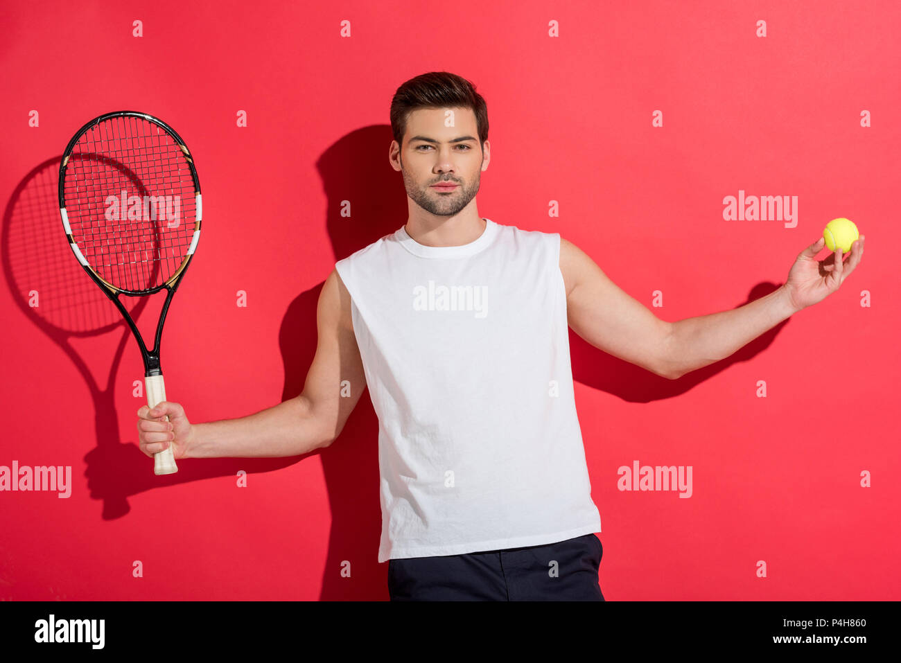 Man holding tennis racket hi-res stock photography and images - Alamy