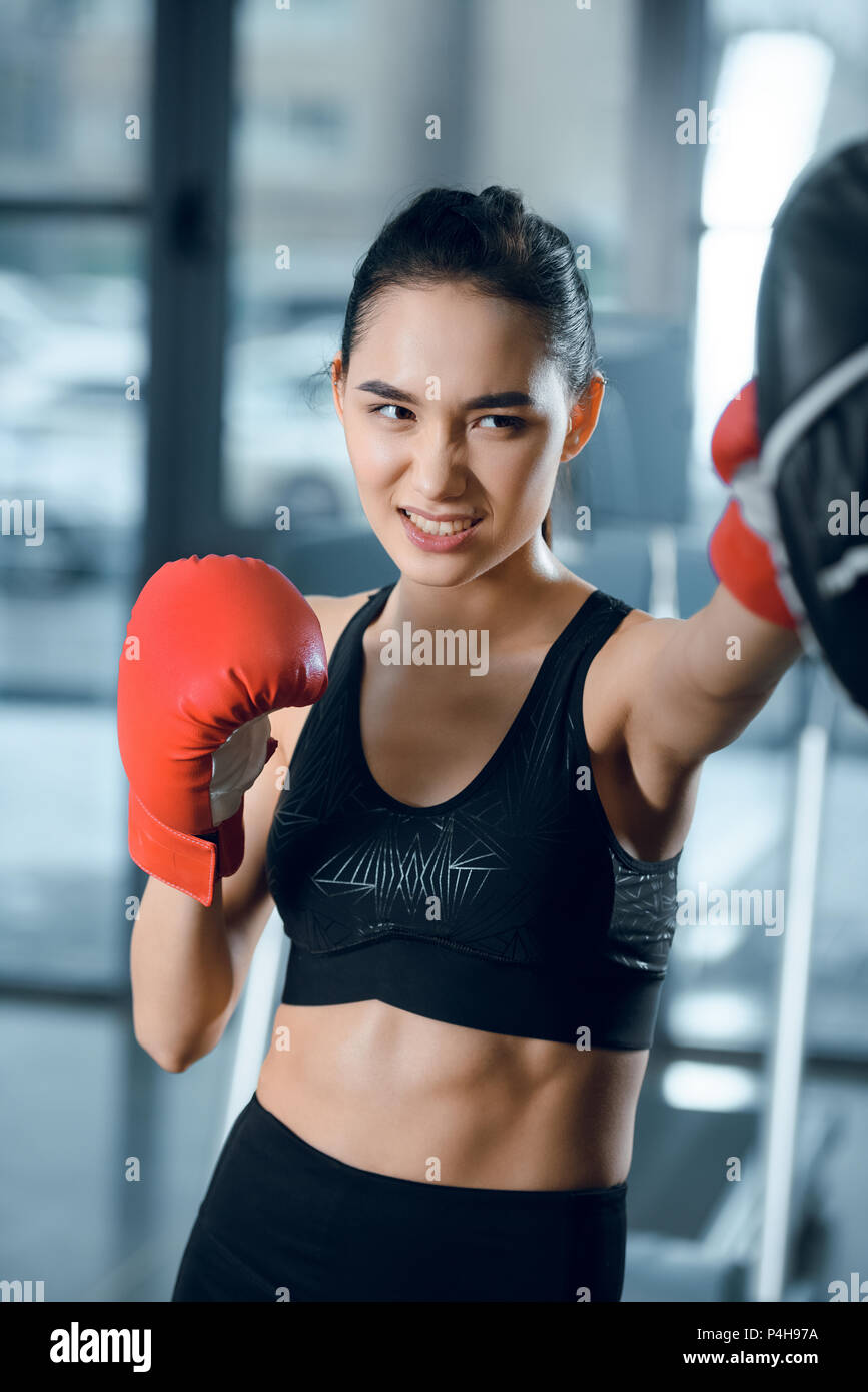 expressive young female boxer training at gym Stock Photo - Alamy