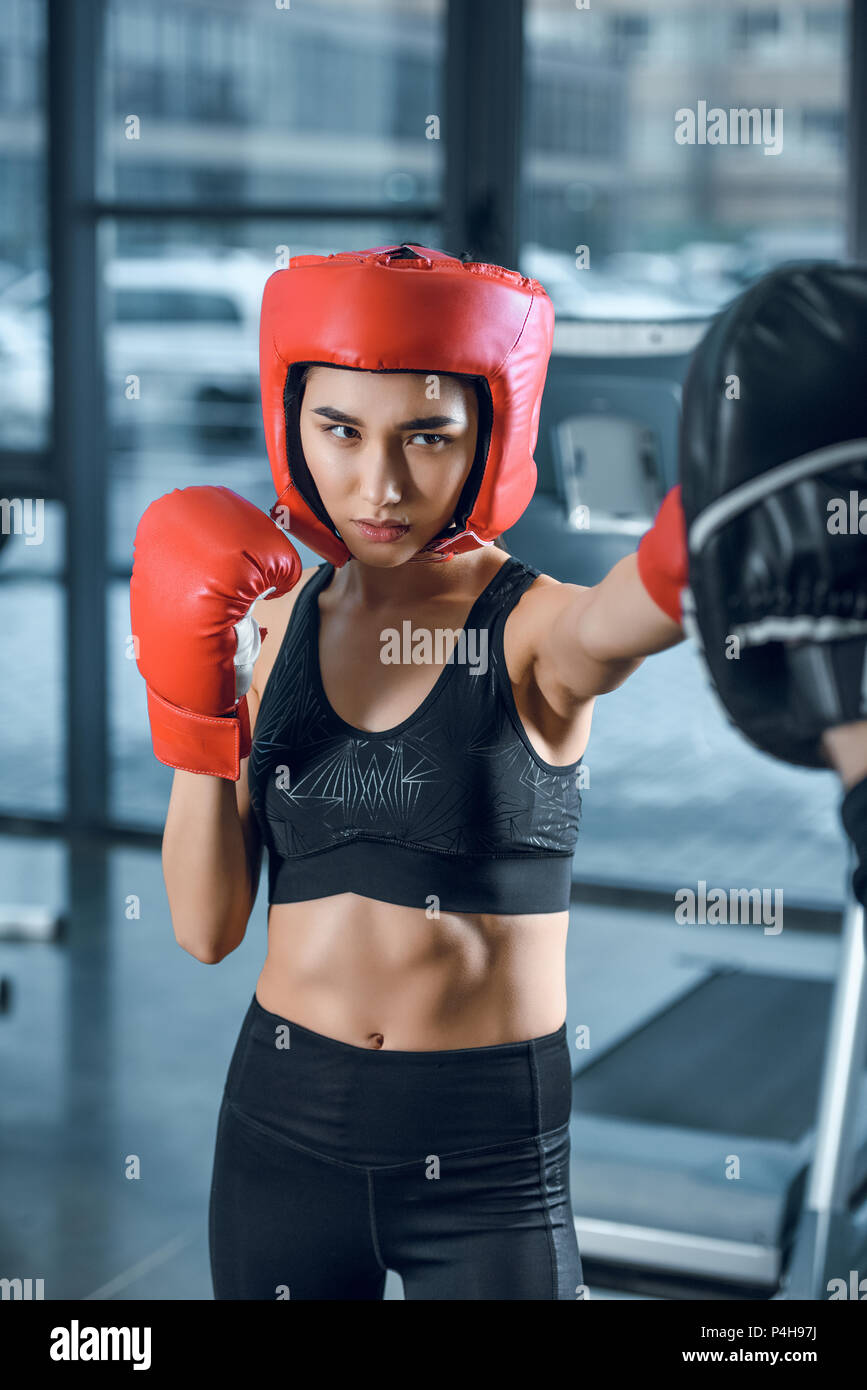 Attractive asian female boxer training hi-res stock photography and ...
