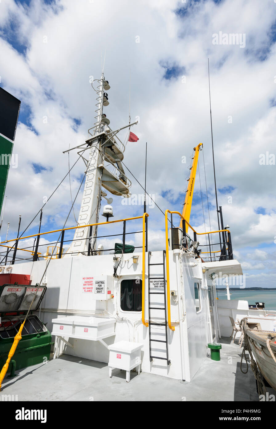 Upper deck and bridge of M.V. Trinity Bay, a SeaSwift vessel navigating ...