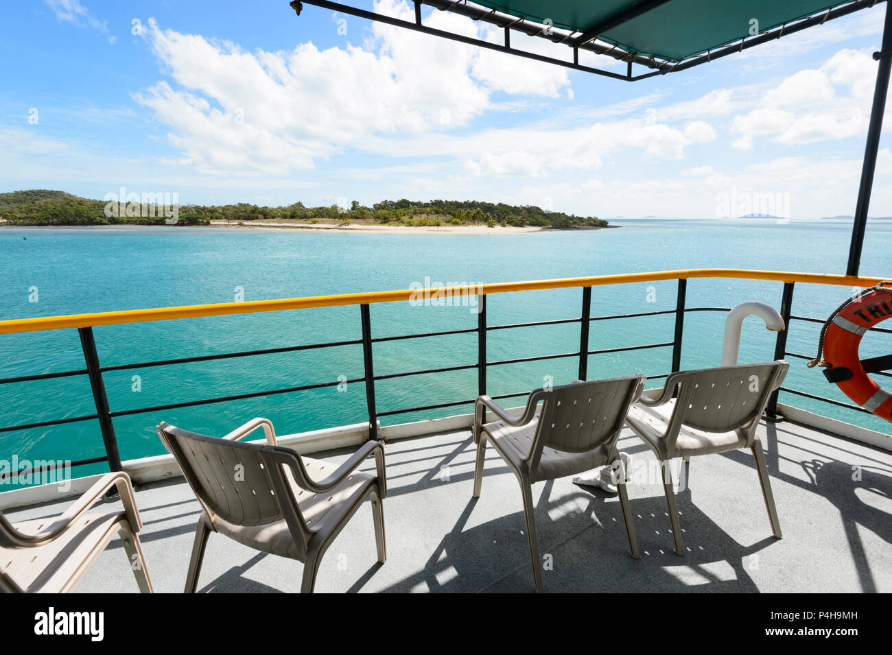 Chairs on deck of M.V. Trinity Bay, a SeaSwift vessel navigating ...