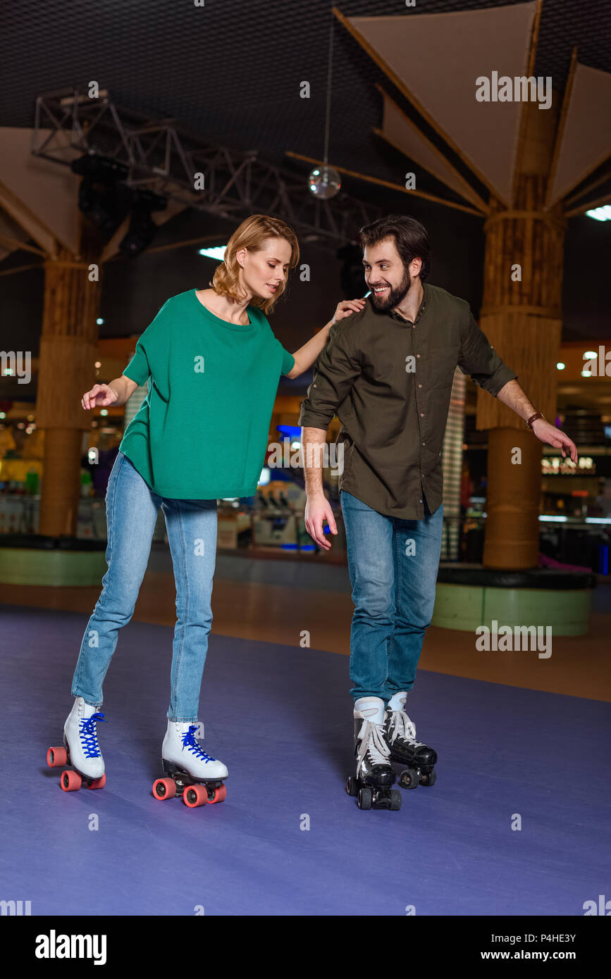 Couple skating together hi-res stock photography and images - Alamy