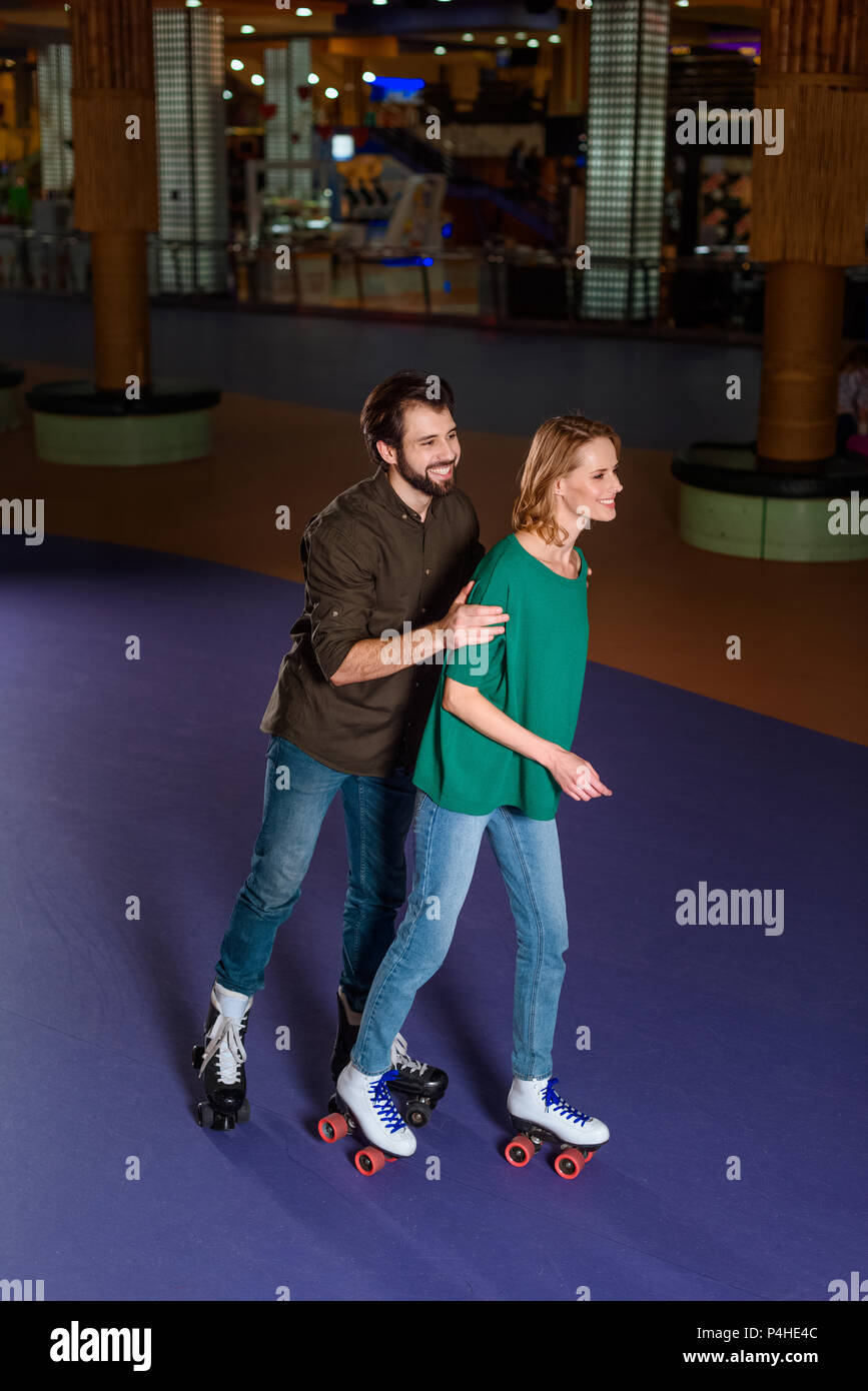 Couple skating together hi-res stock photography and images - Alamy