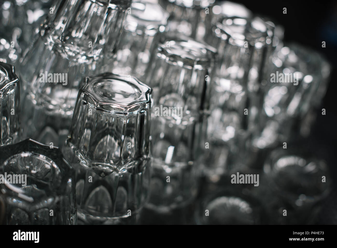 clean empty glasses for drinks on pile Stock Photo - Alamy