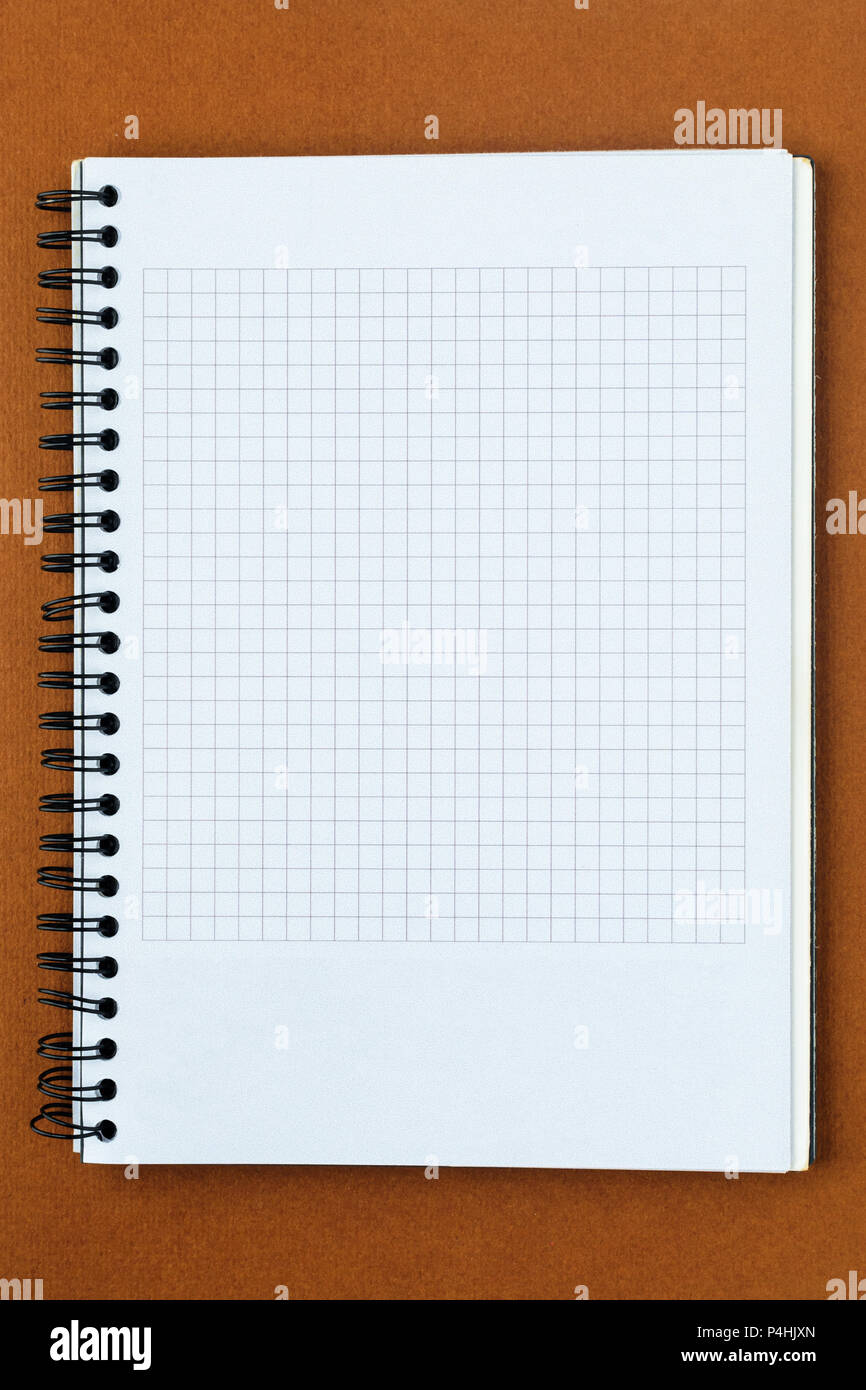 White paper notes on a brown background Stock Photo - Alamy