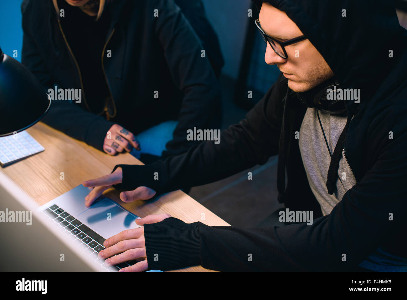 Male female hacker working together hi-res stock photography and images ...