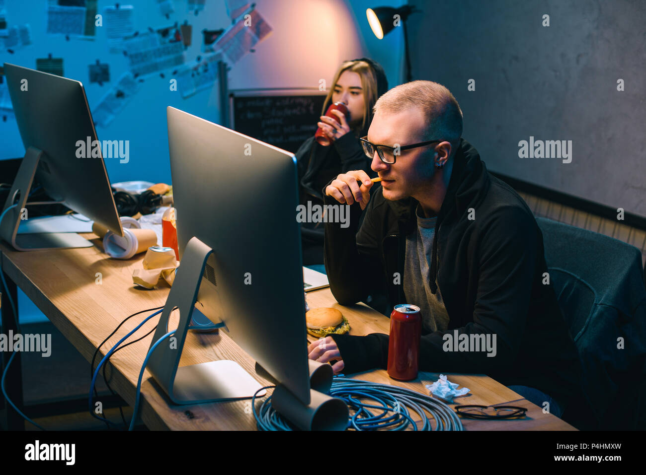 hackers drinking beer and eating junk food while working on malware ...