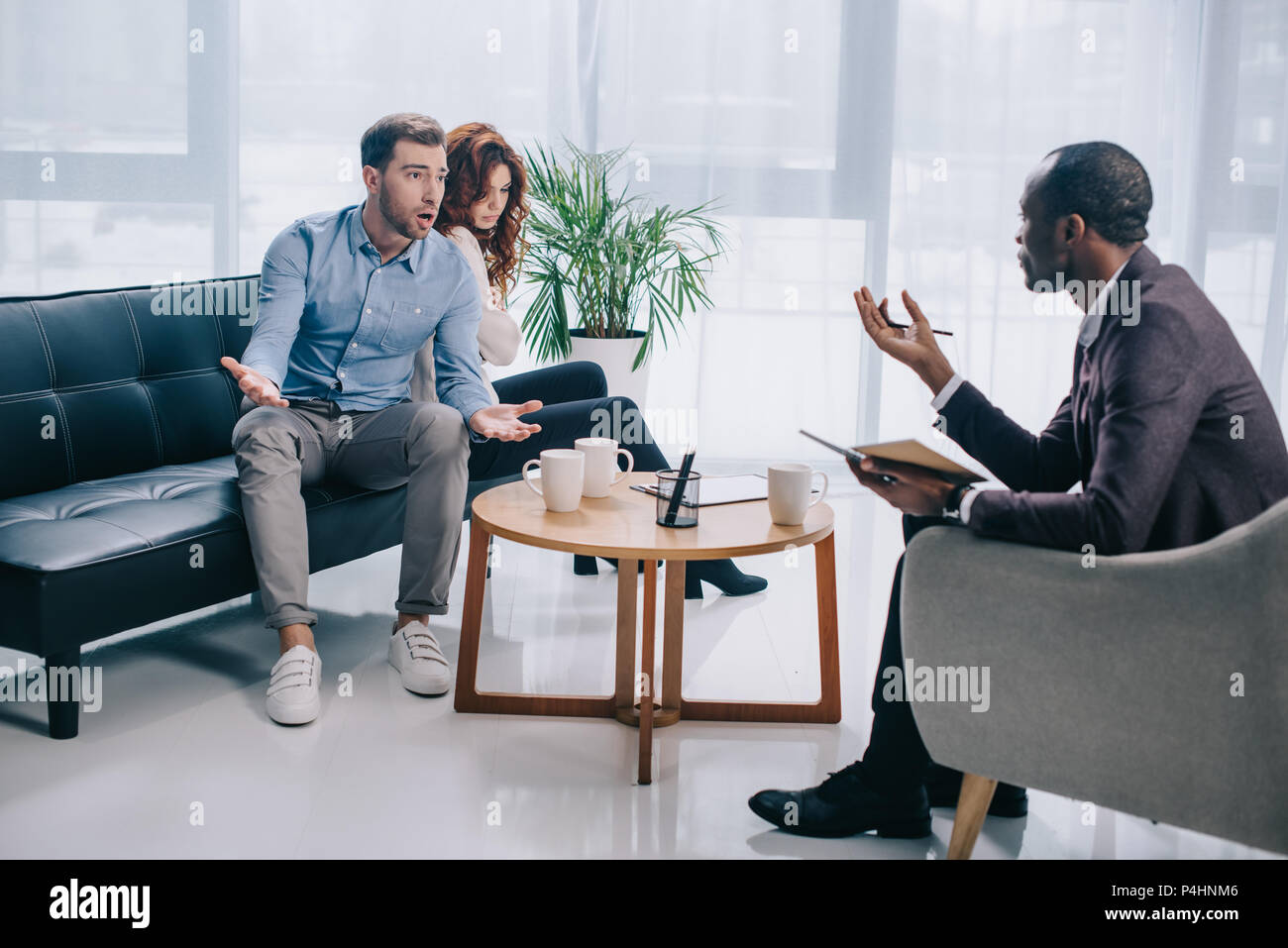 Men arguing sitting caucasian hi-res stock photography and images - Alamy