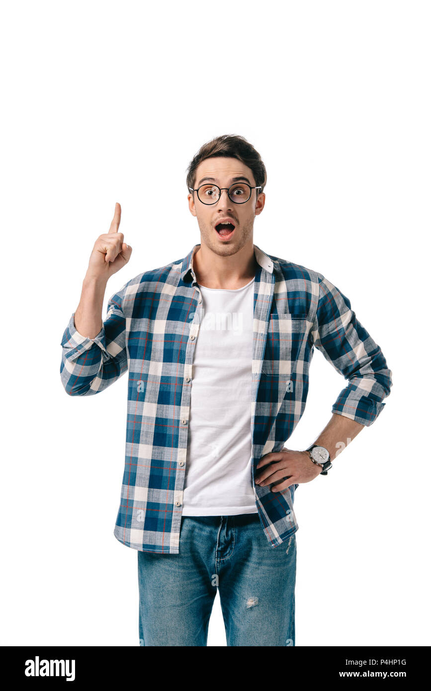 surprised handsome man pointing on something isolated on white Stock ...