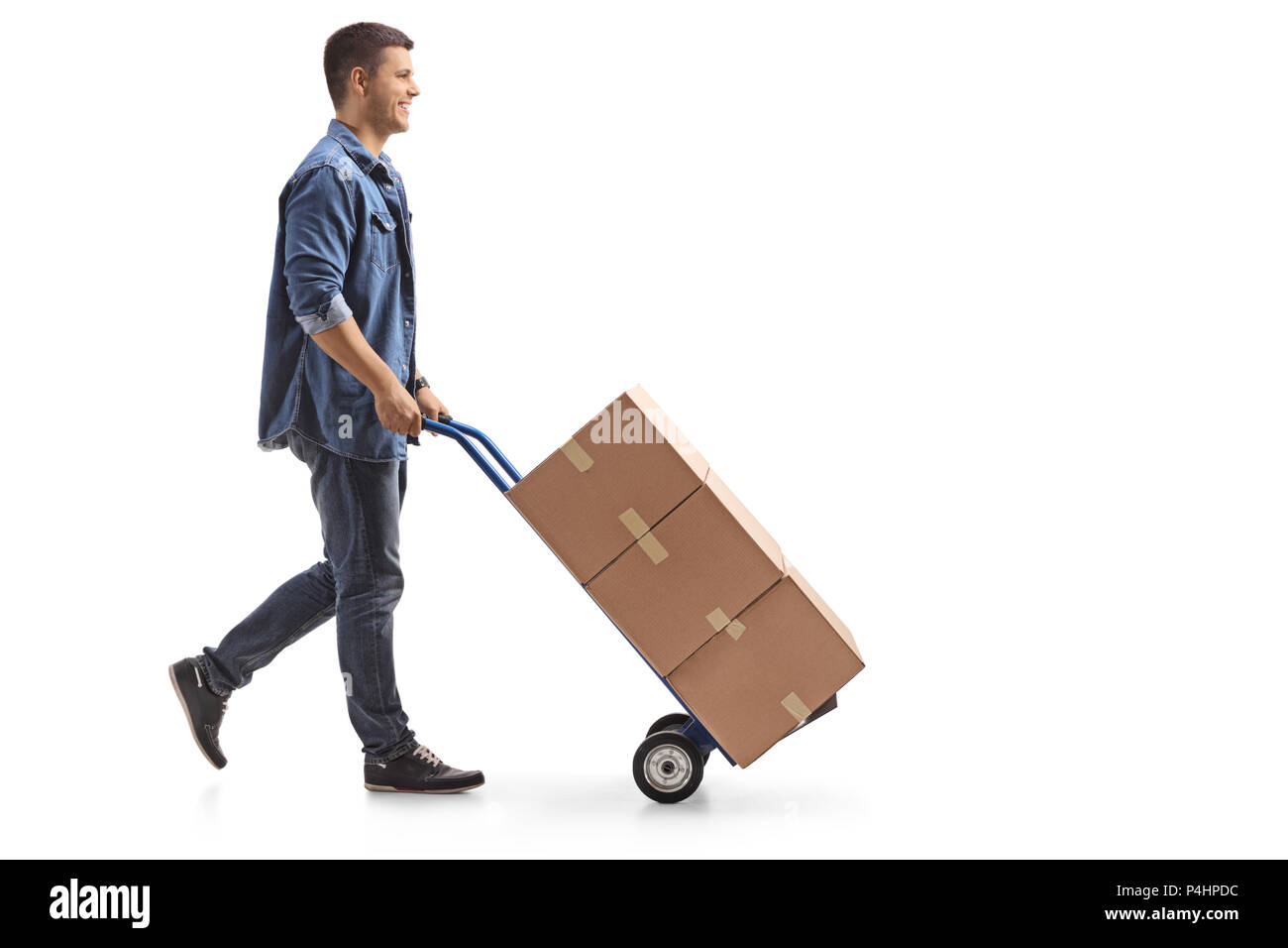 Pushing a heavy load Cut Out Stock Images & Pictures - Alamy