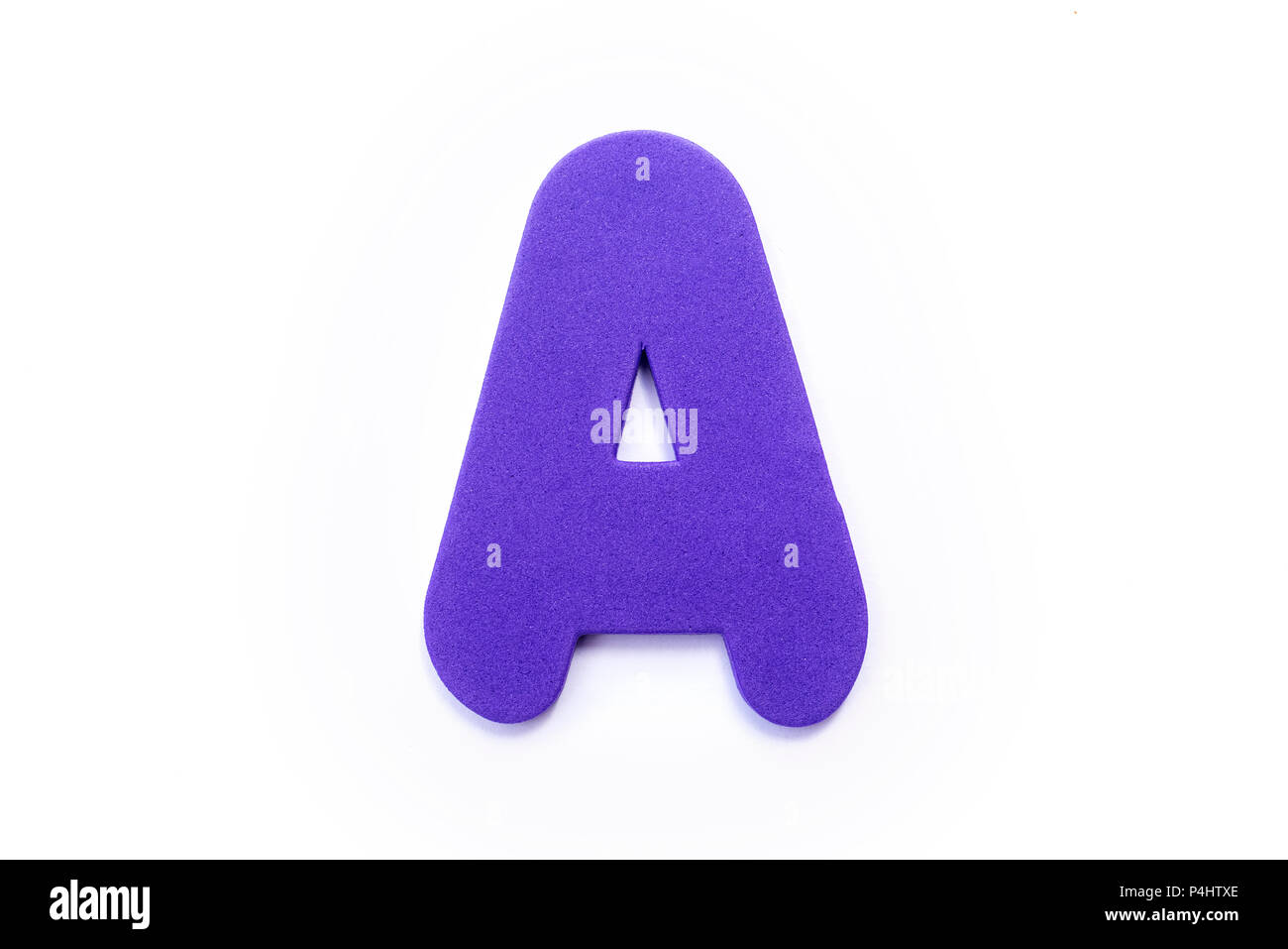 Purple letter A over a white background Stock Photo - Alamy
