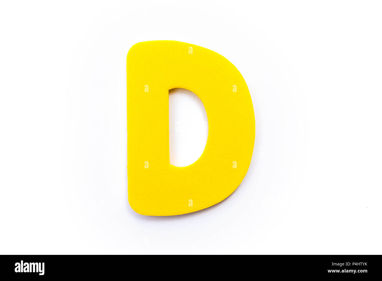Yellow letter D over a white background Stock Photo - Alamy