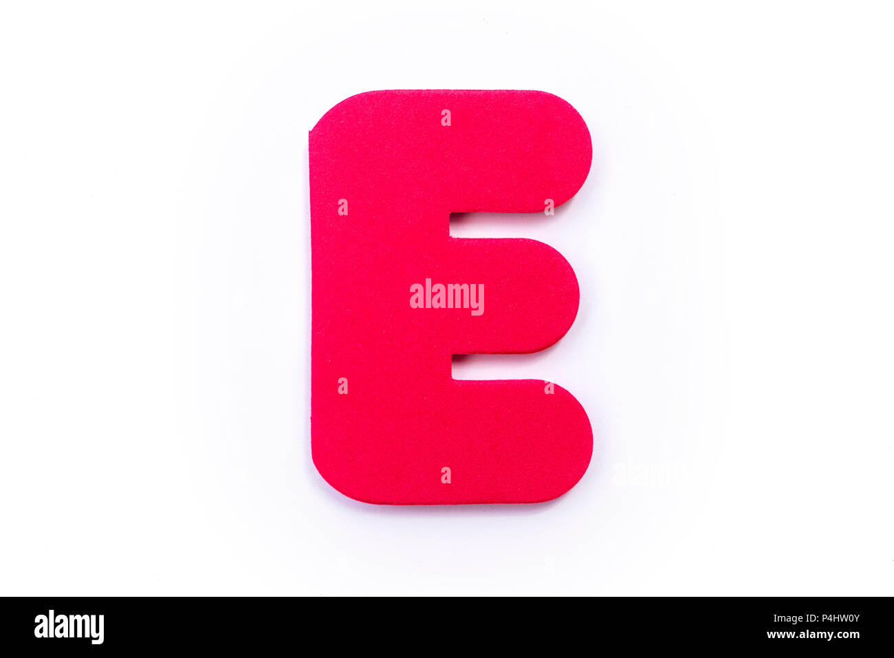 Red letter E over a white background Stock Photo - Alamy