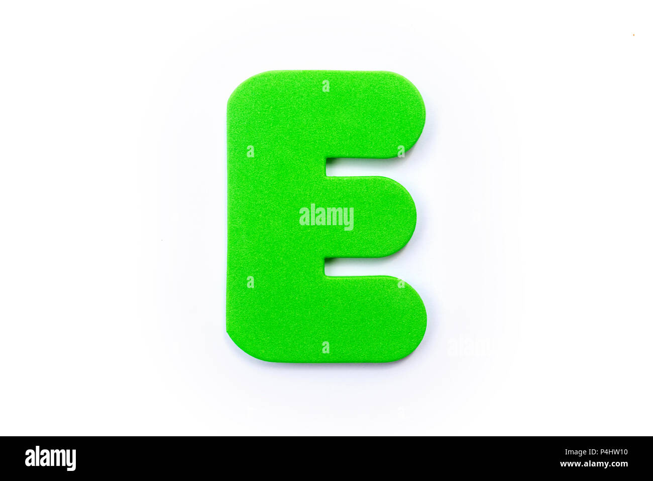 Green letter E over a white background Stock Photo - Alamy