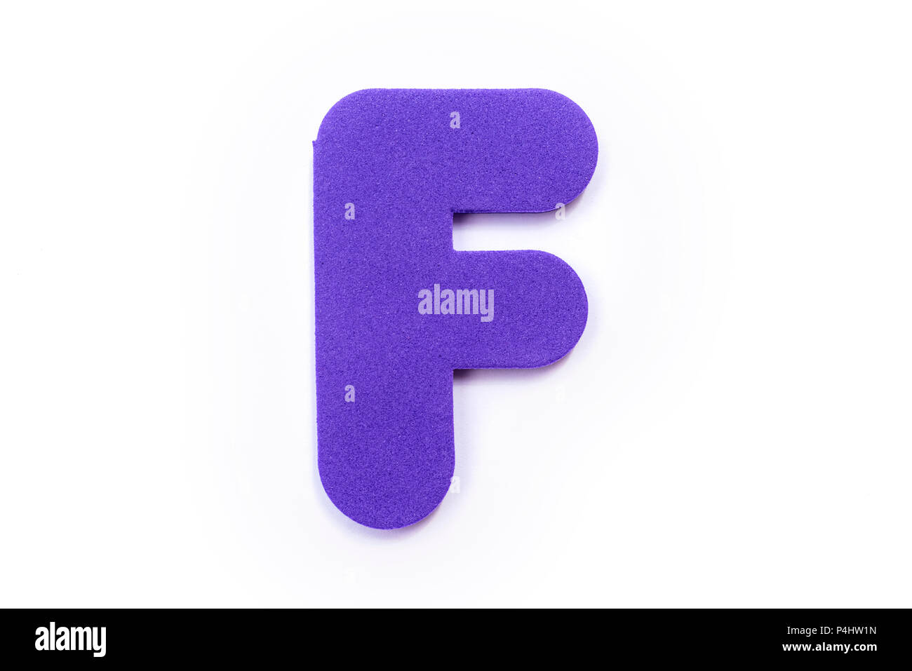 Purple Letter F over a white background Stock Photo - Alamy