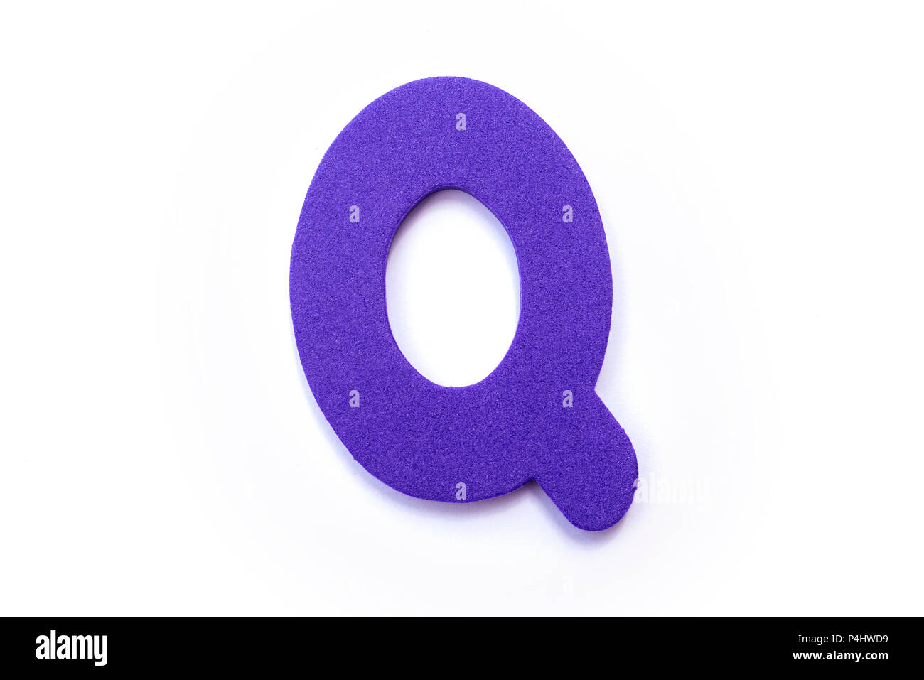 Purple Letter Q over a white background Stock Photo - Alamy