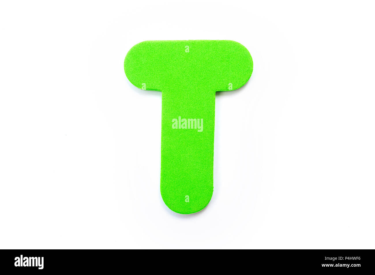 Green Letter T over a white background Stock Photo - Alamy