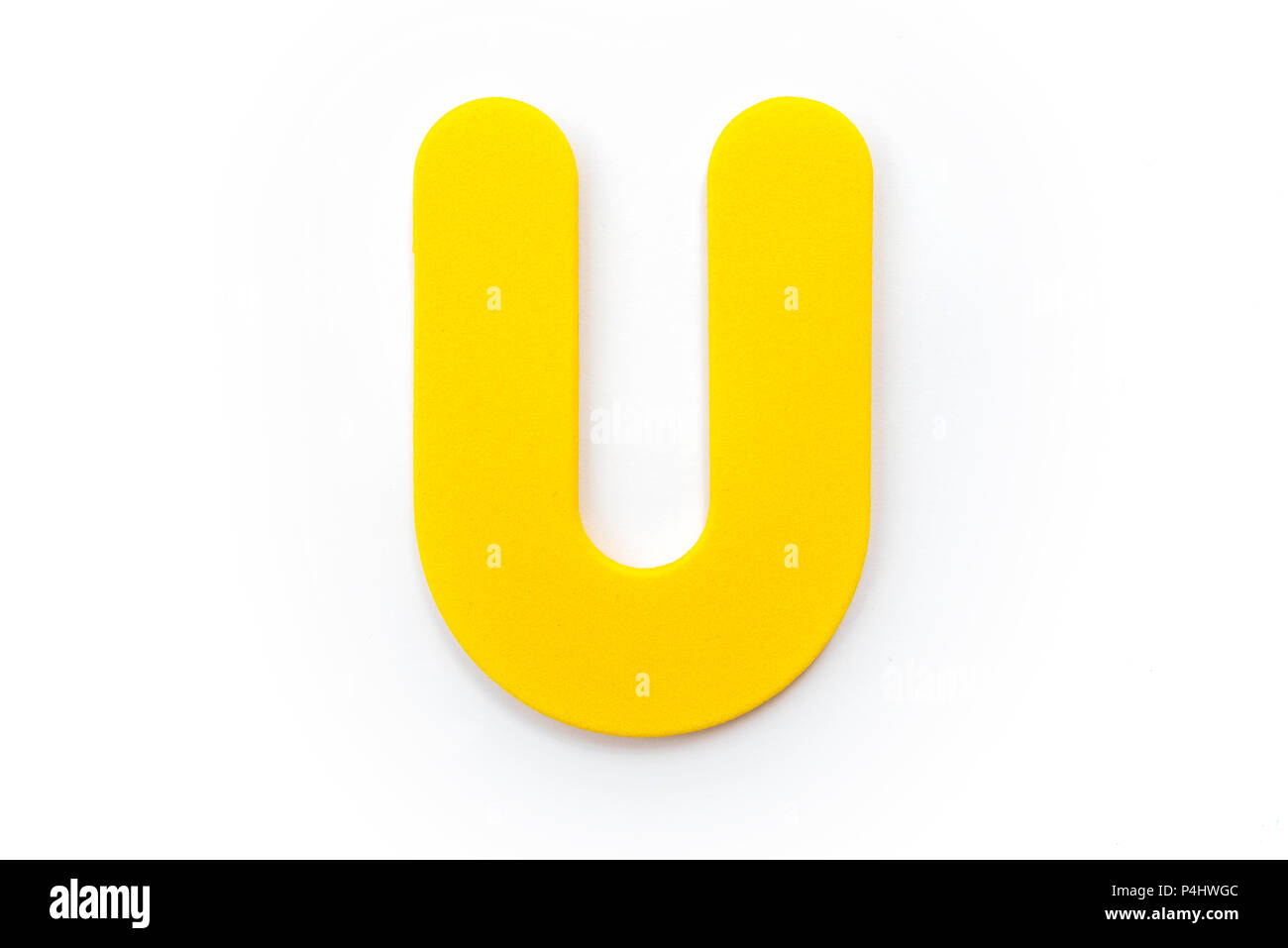 Yellow Letter U over a white background Stock Photo - Alamy