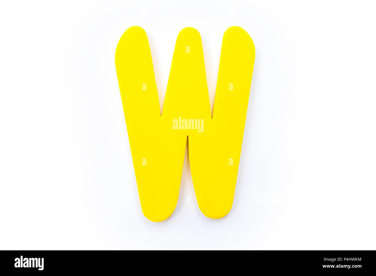 Yellow Letter W over a white background Stock Photo - Alamy