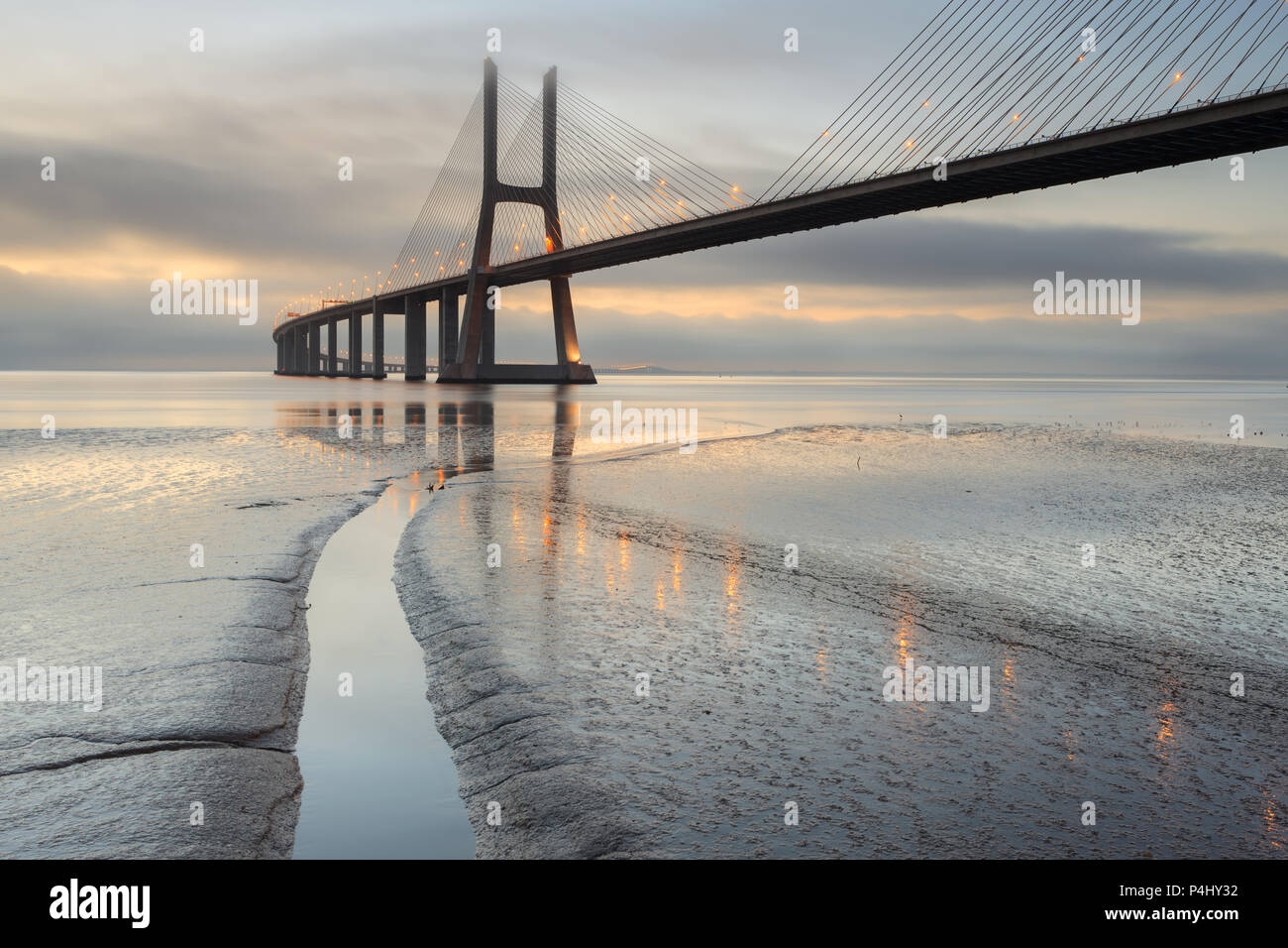 Vasco da Gama Bridge landscape at sunrise. One of the longest bridges ...