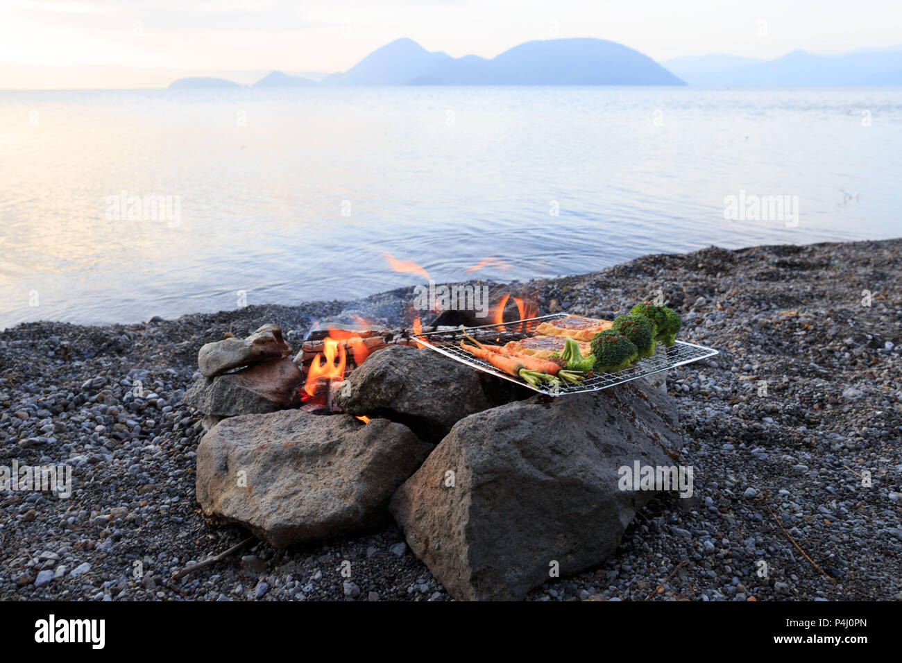 Vegetables over open flame hi-res stock photography and images - Alamy