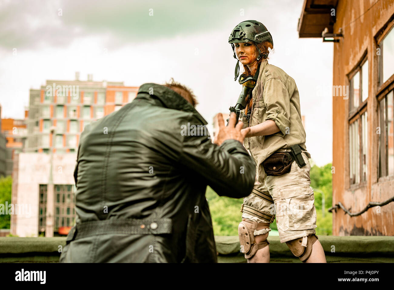Gunpoint a man lying on the ground hi-res stock photography and images ...