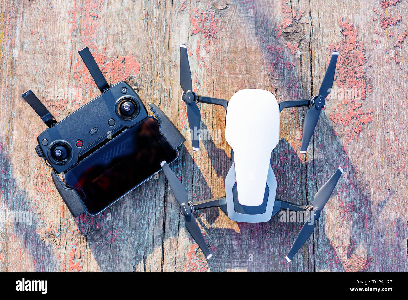 Drone and control panel on an old board Stock Photo - Alamy