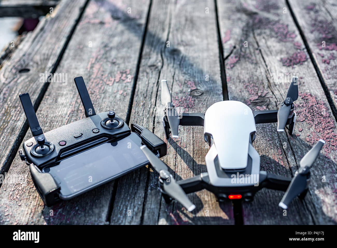 Drone and control panel on an old board Stock Photo - Alamy