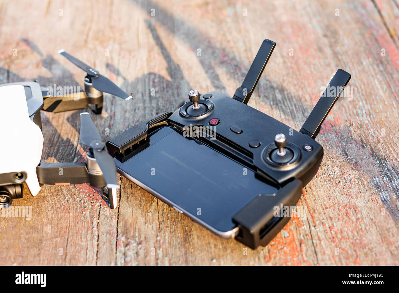 Drone and control panel on an old board Stock Photo - Alamy