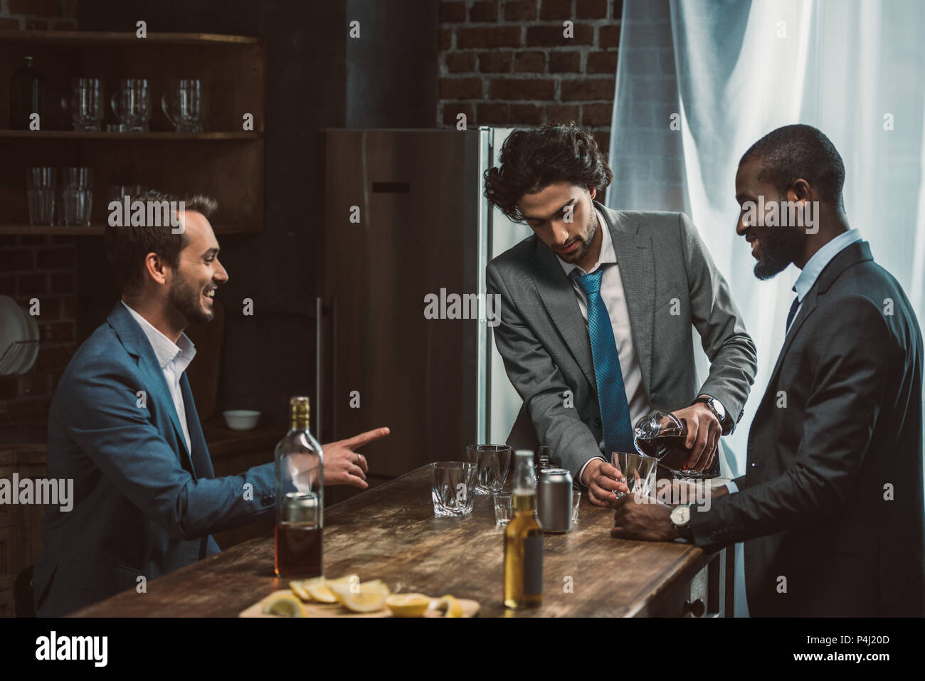 Booze and men and suits hi-res stock photography and images - Alamy