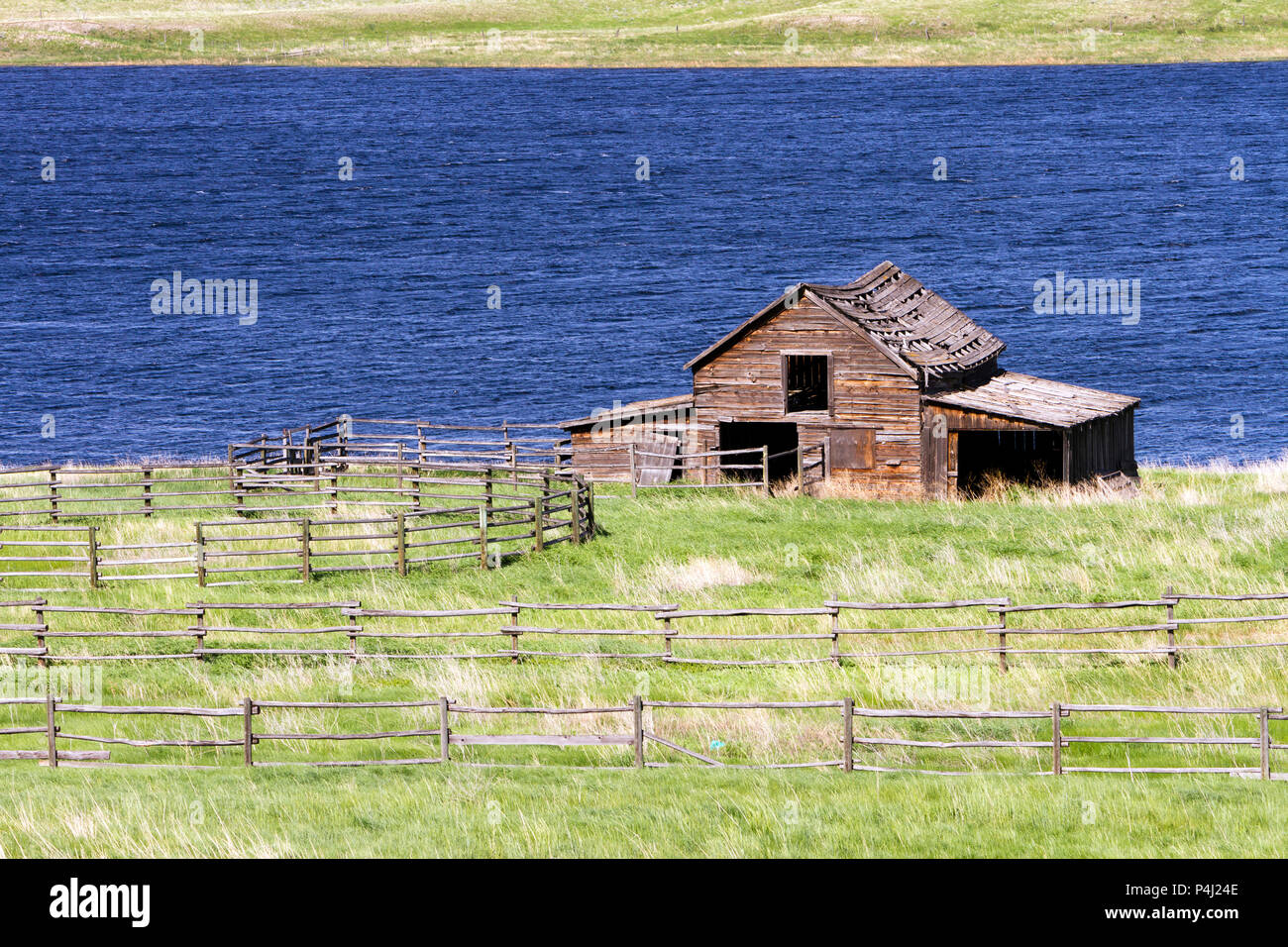 An old abandoned rustic wood ranch house barn on Separation Lake near ...