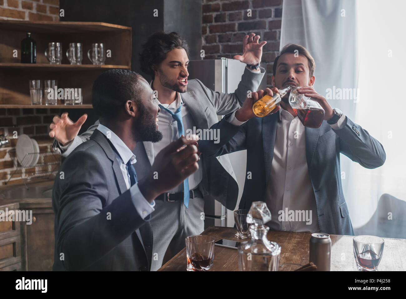 Booze and men and suits hi-res stock photography and images - Alamy