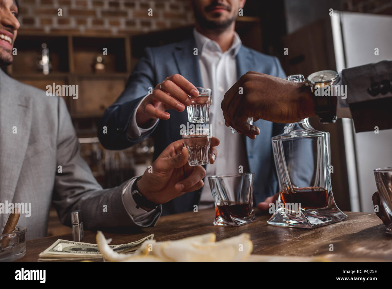 Booze and men and suits hi-res stock photography and images - Alamy
