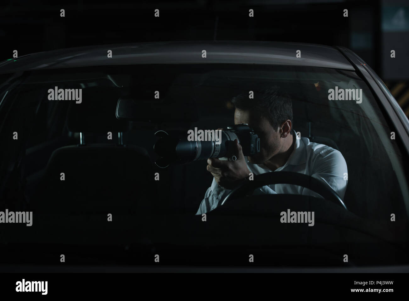 Man and car and camera and detective hi-res stock photography and ...