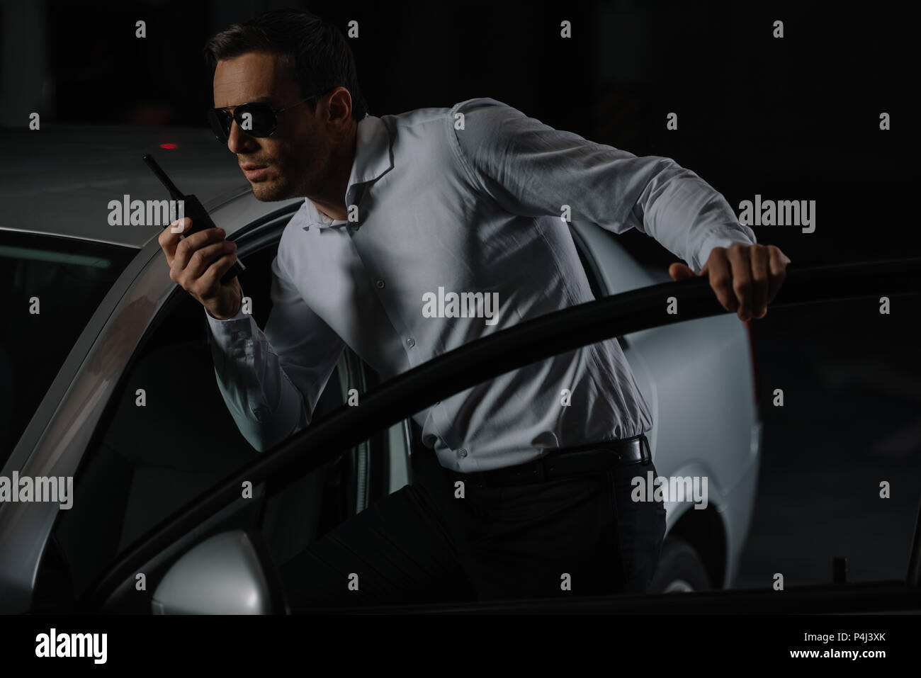 Man using radio in car hi-res stock photography and images - Alamy