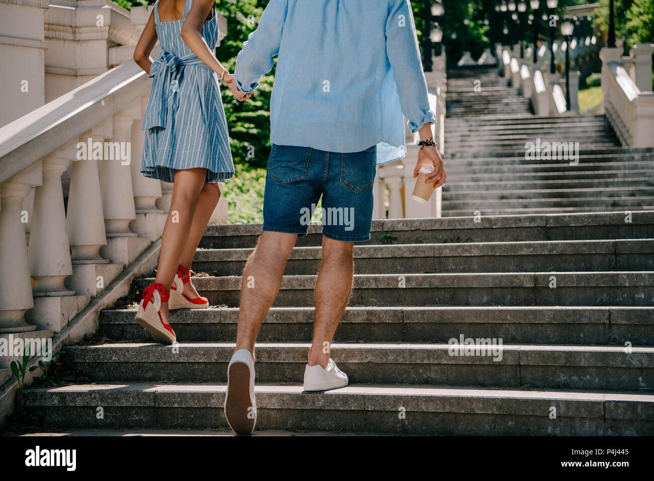 Couple going upstairs hi-res stock photography and images - Alamy