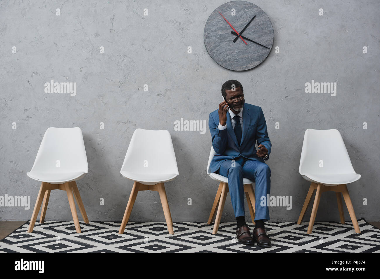 Angry middle aged businessman sitting hi-res stock photography and ...