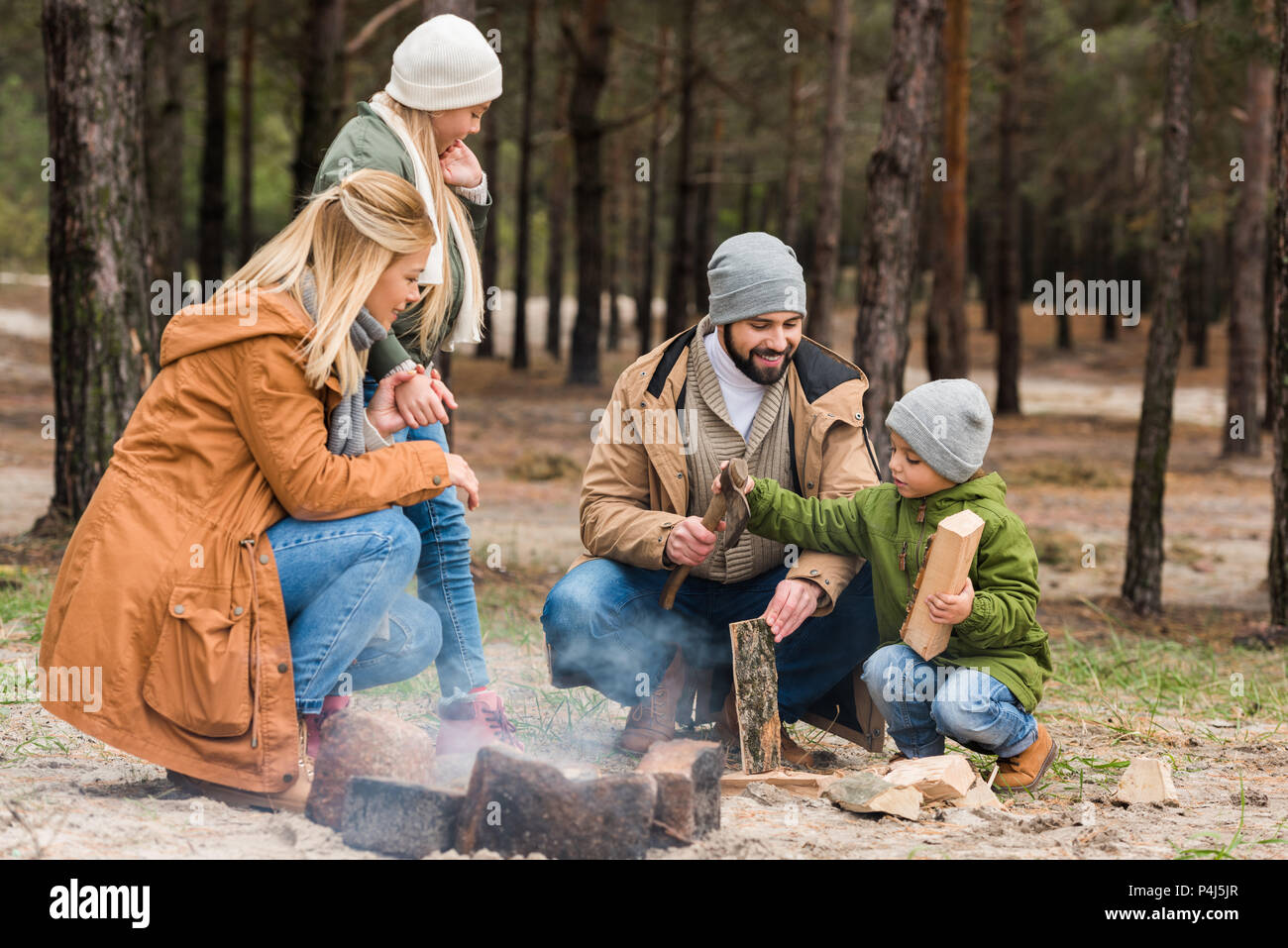 Campfire in the forest hi-res stock photography and images - Alamy
