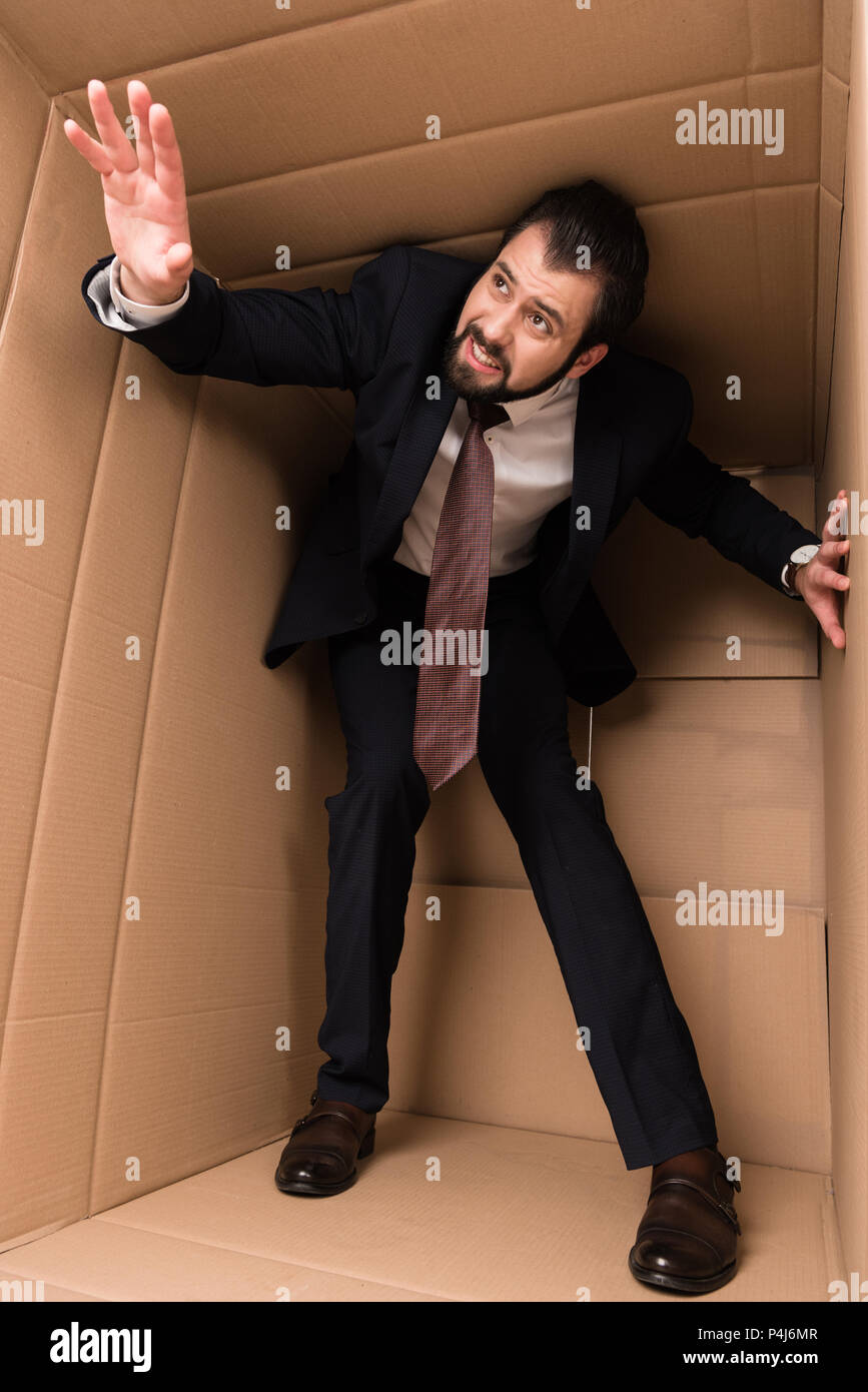 Man suit alone stand sad hi-res stock photography and images - Alamy