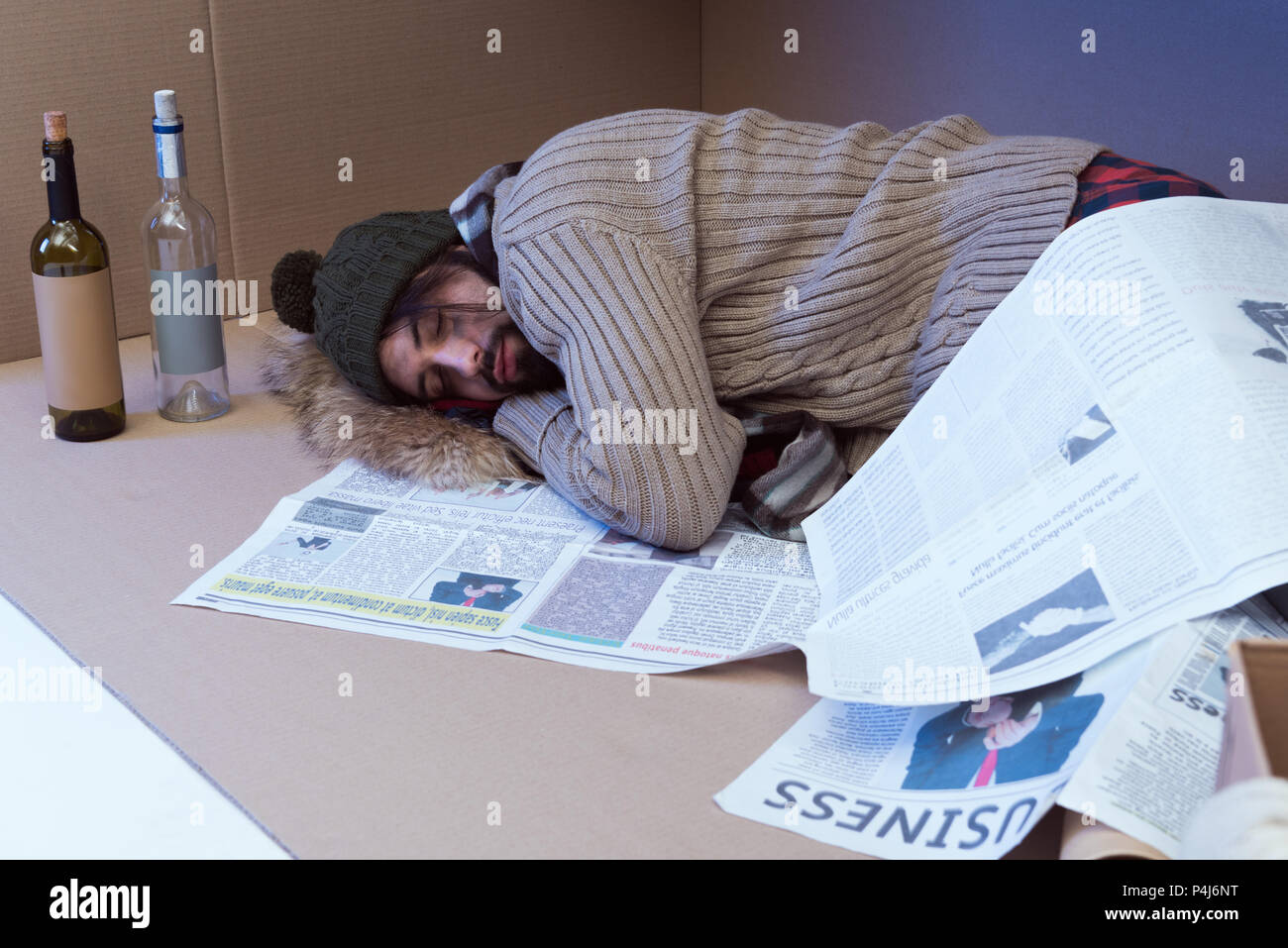 Homeless sleeping in cardboard box hi-res stock photography and images ...