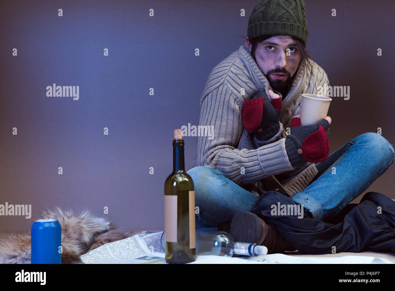 frozen homeless poor man asking for alms in cardboard box Stock Photo ...