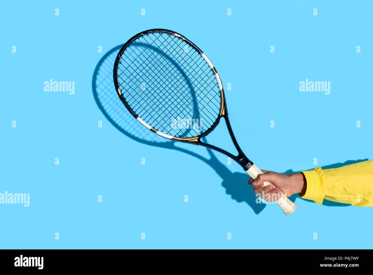 Hand holding tennis racket hi-res stock photography and images - Alamy