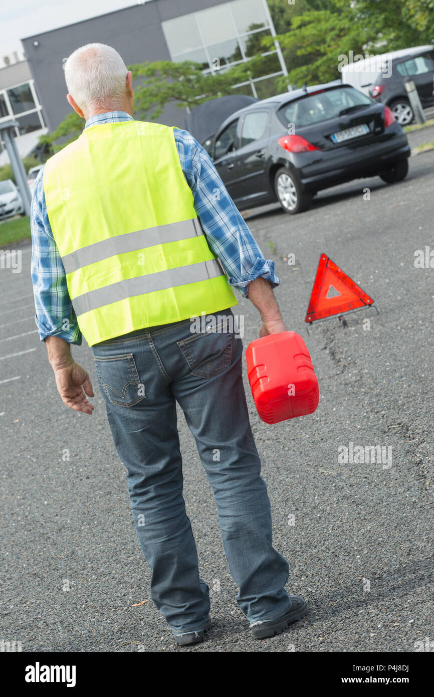 Man walking gas can hi-res stock photography and images - Alamy