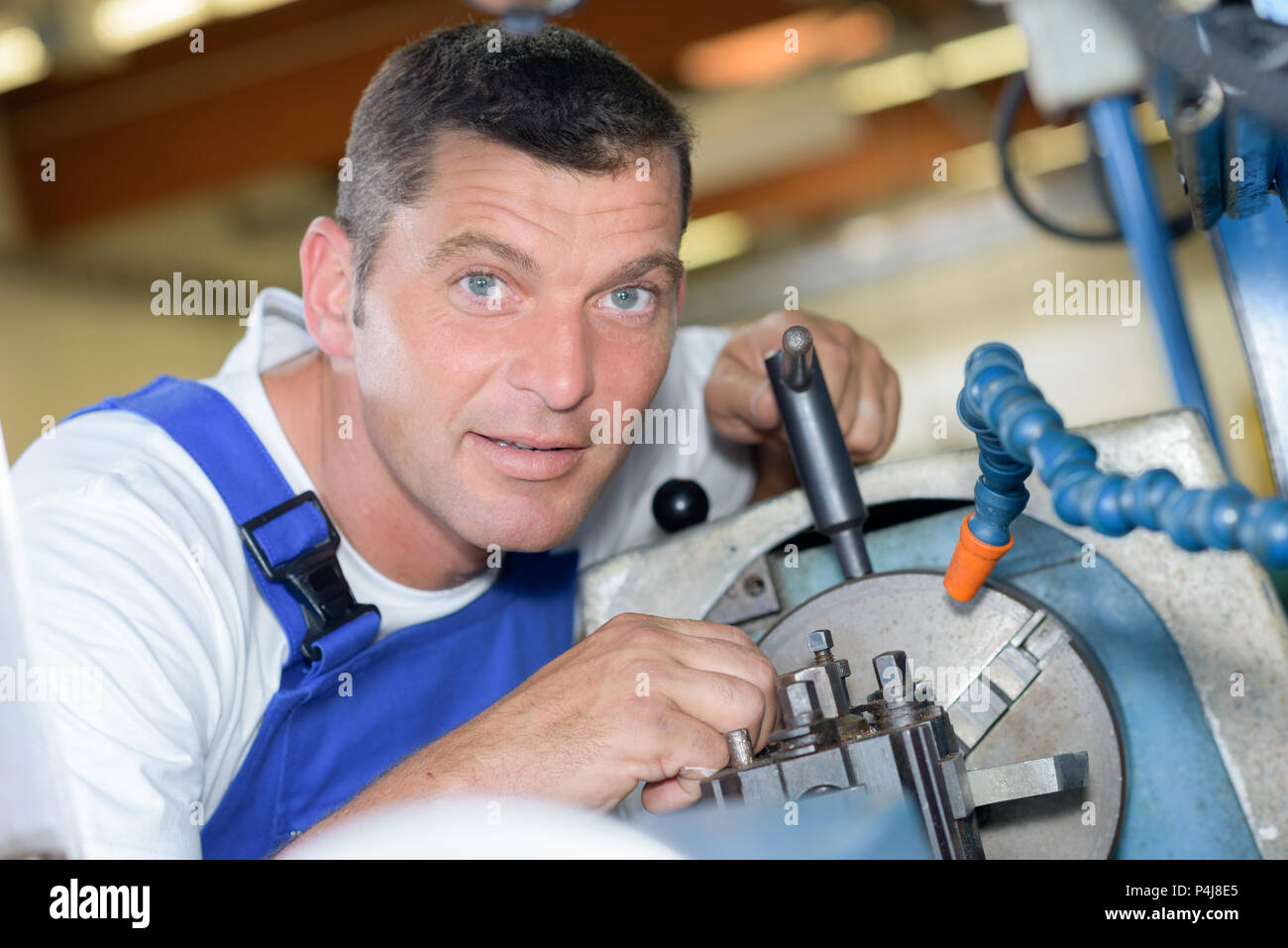 working with a machine Stock Photo - Alamy