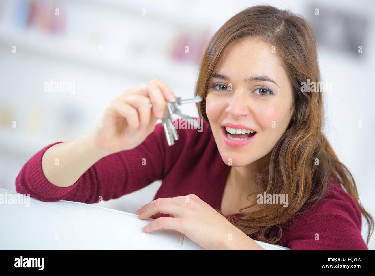 Woman with set of keys hi-res stock photography and images - Alamy
