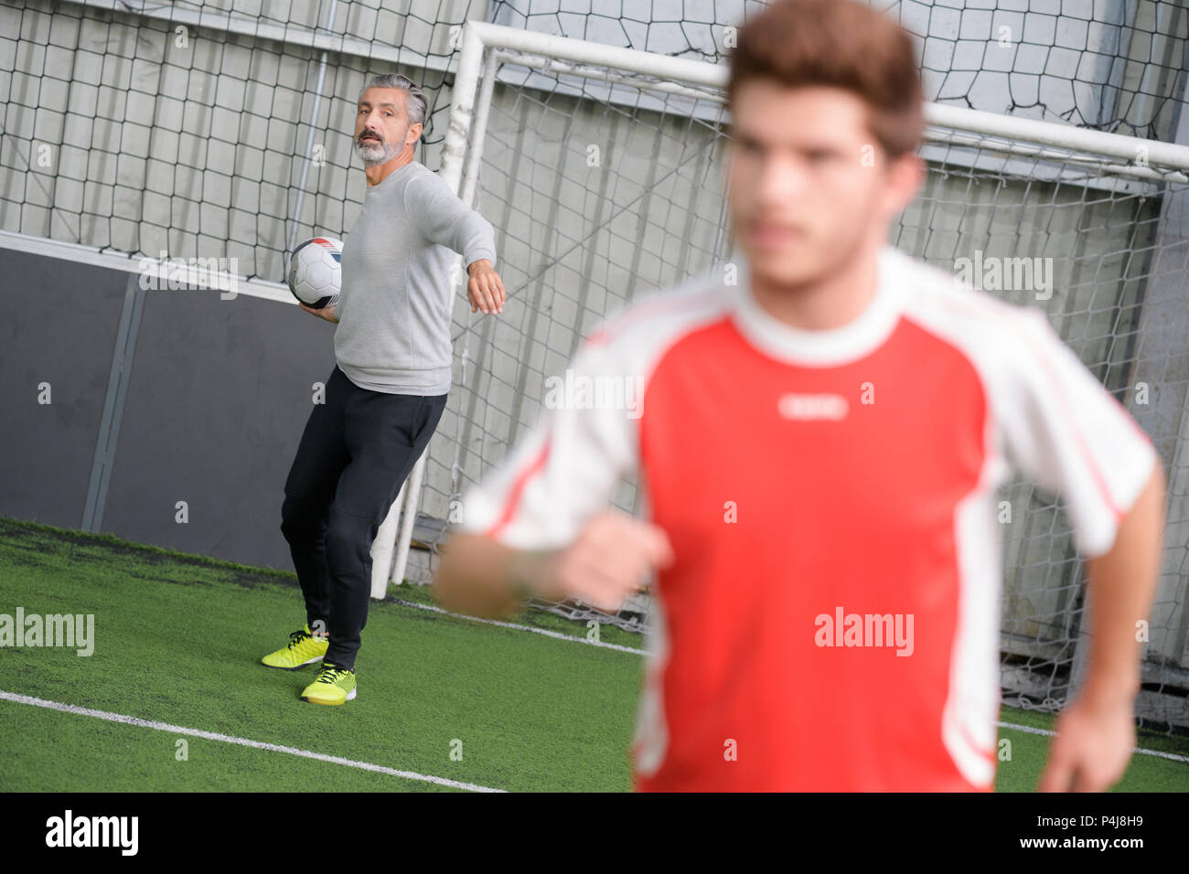 Indoor football pitch training hi-res stock photography and images - Alamy