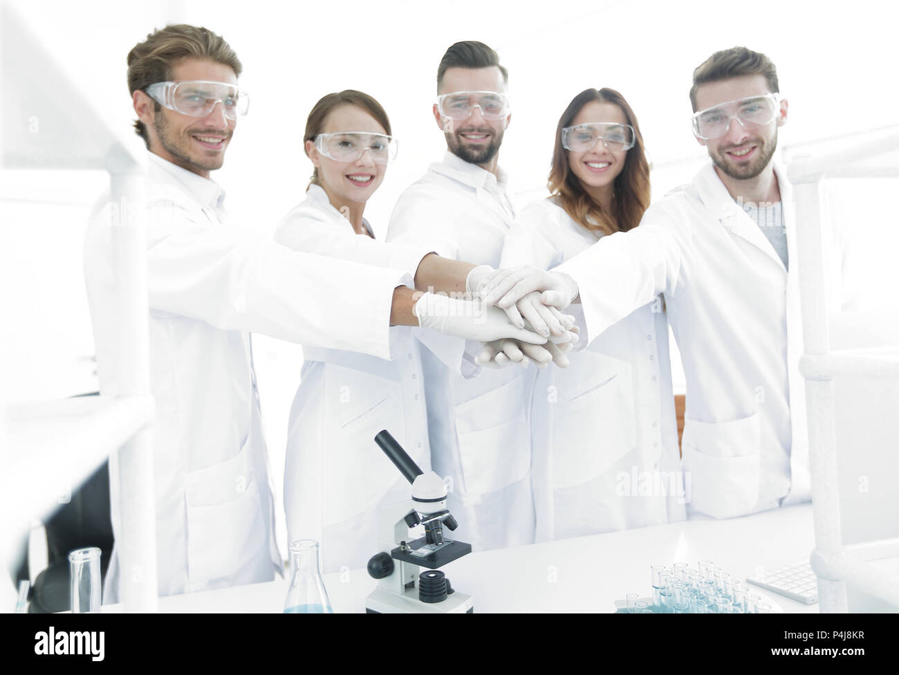 creative team of young scientists Stock Photo - Alamy